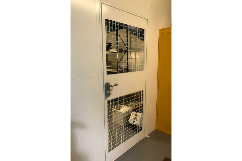 Large Double Doors with Service Hatch in Mesh Partitioning | MeshSTOR