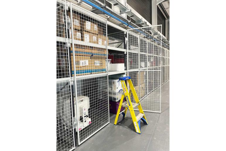 Design and Service Company uses longspan shelving with lockable doors ...